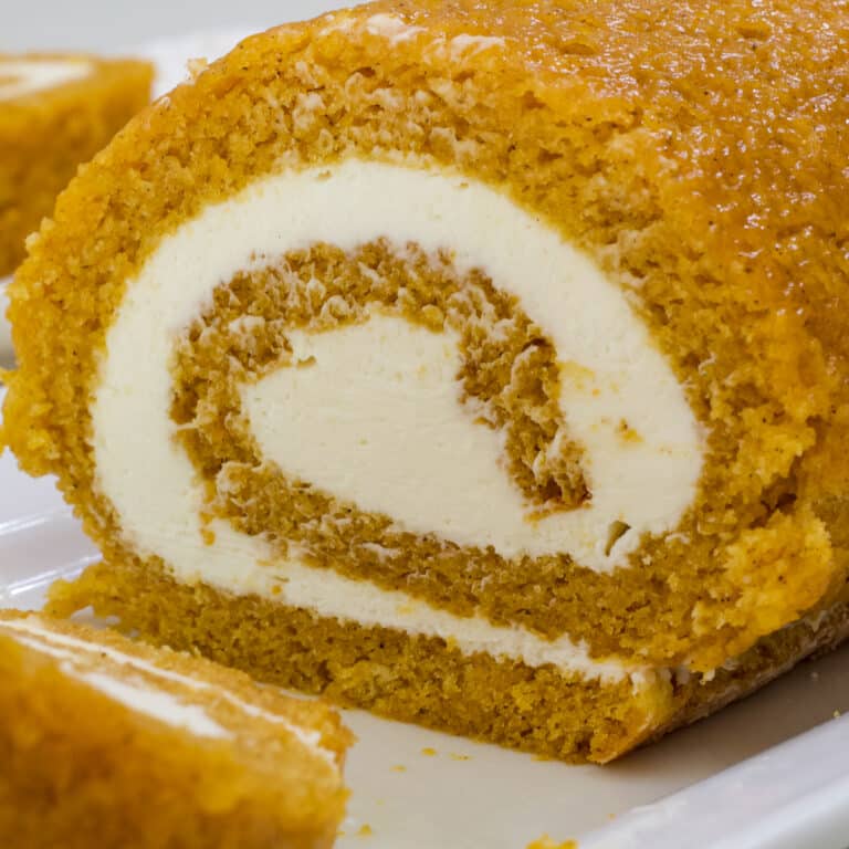 Pumpkin Roll with Cream Cheese Filling - Mindy's Cooking Obsession